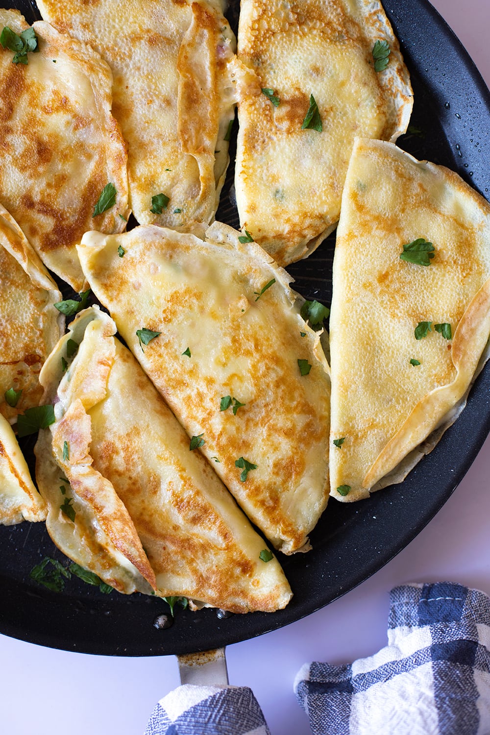 Ham and cheese crepes with bechamel sauce - Picnic on a Broom