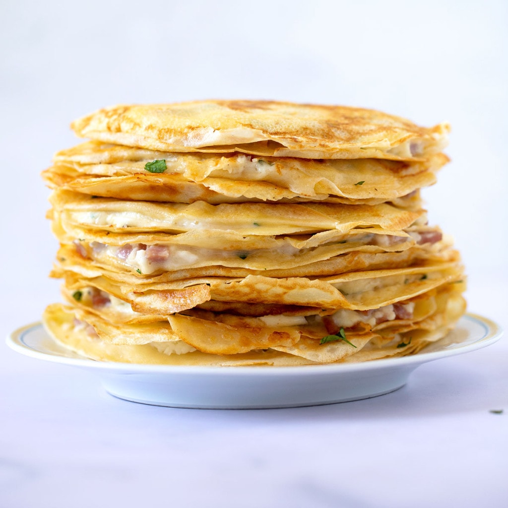 Ham and cheese crepes with bechamel sauce - Picnic on a Broom
